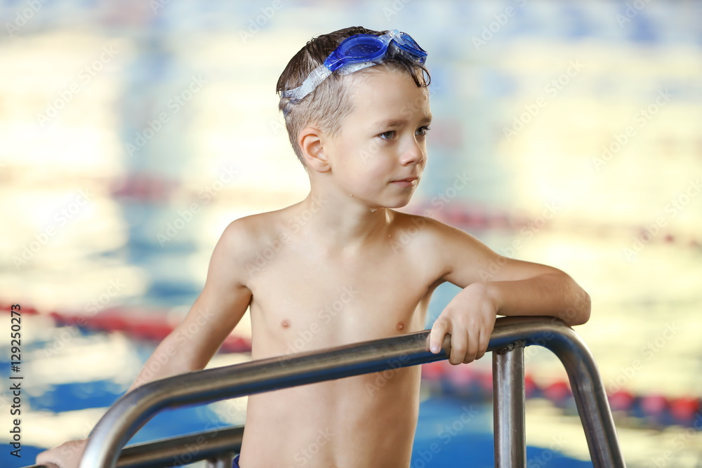 Cute boy in the sport swimming pool Stock Photo | Adobe Stock