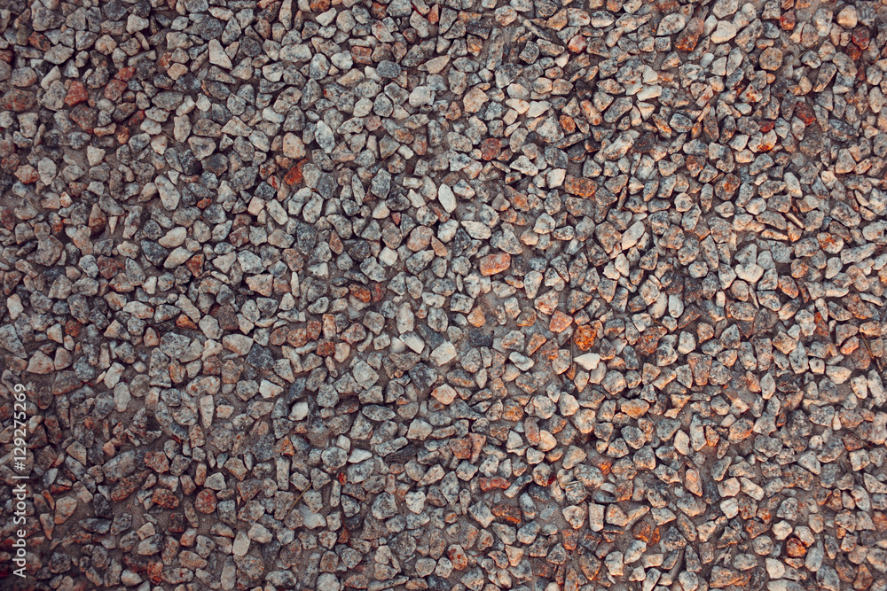 Gray small granite stone floor background. Stone rubble background ...