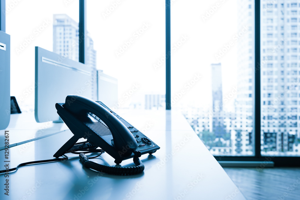 Telephone on desk with big window city view.Modern office Stock Photo ...