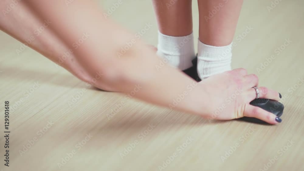 Close-up feet of the child in dance position. Children's feet in the ...