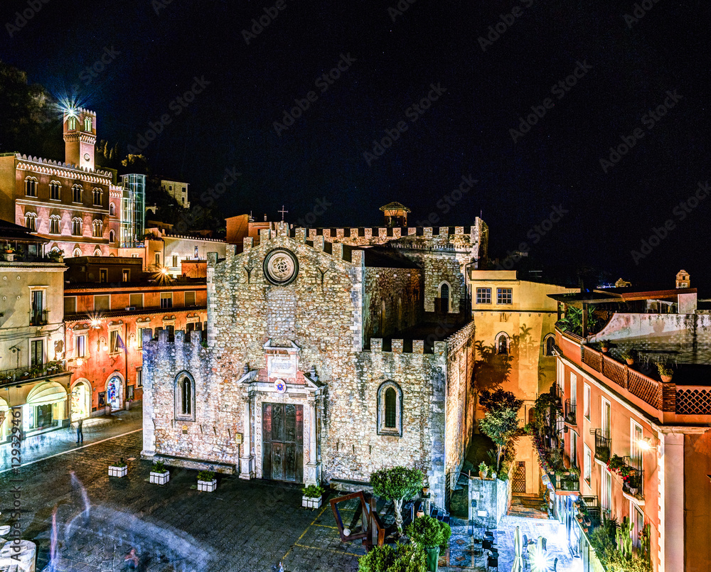 The Duomo in most popular sicilian resort Taormina. Night aerial view ...