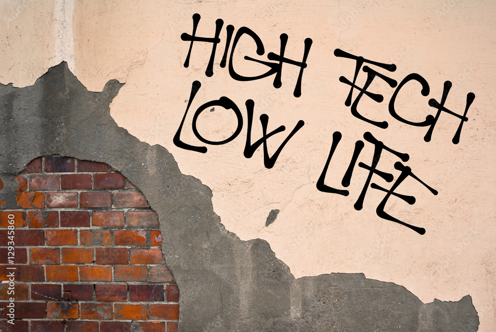 Foto Stock High Tech Low Life - handwritten graffiti sprayed on the ...