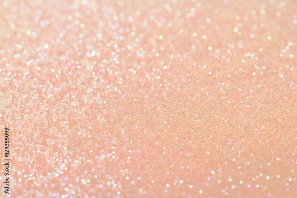 Abstract pink glitter background with shining light and soft bokeh ...