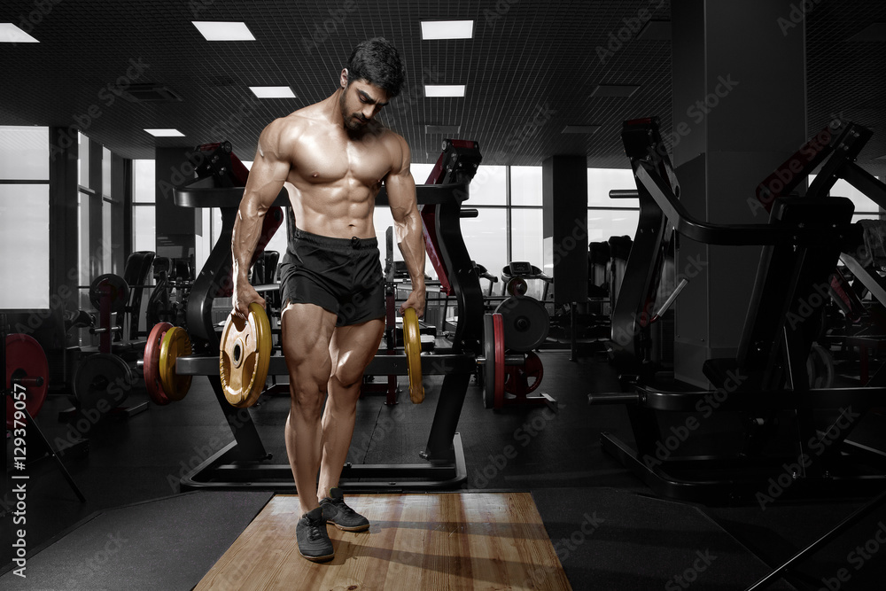Muscular athletic bodybuilder fitness model Stock Photo | Adobe Stock