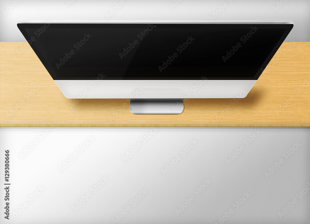 Modern computer monitor with black screen on wooden desk and grey ...