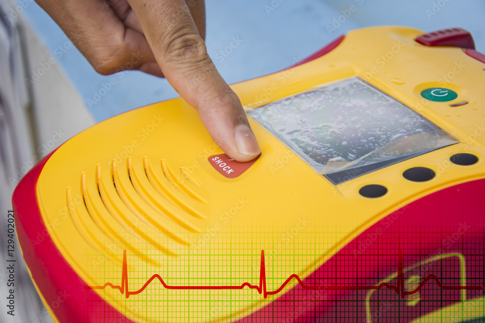 Automated External Defibrillator show finger push button shock Stock 사진 ...