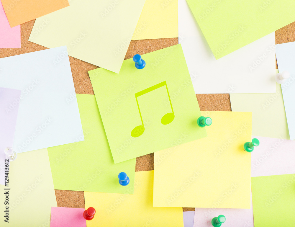 Music note symbol on notice board in office. Background or backdrop for ...