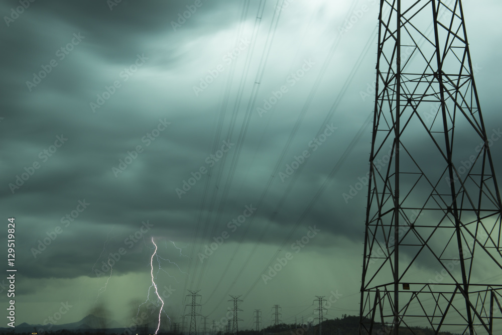 High voltage power lines during a lightning storm in Queensland ...