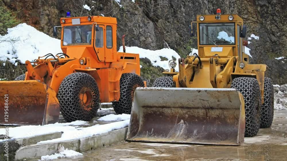 Two Snow Mover Diggers For Winter Road Maintenance With Zoom on Bucket ...
