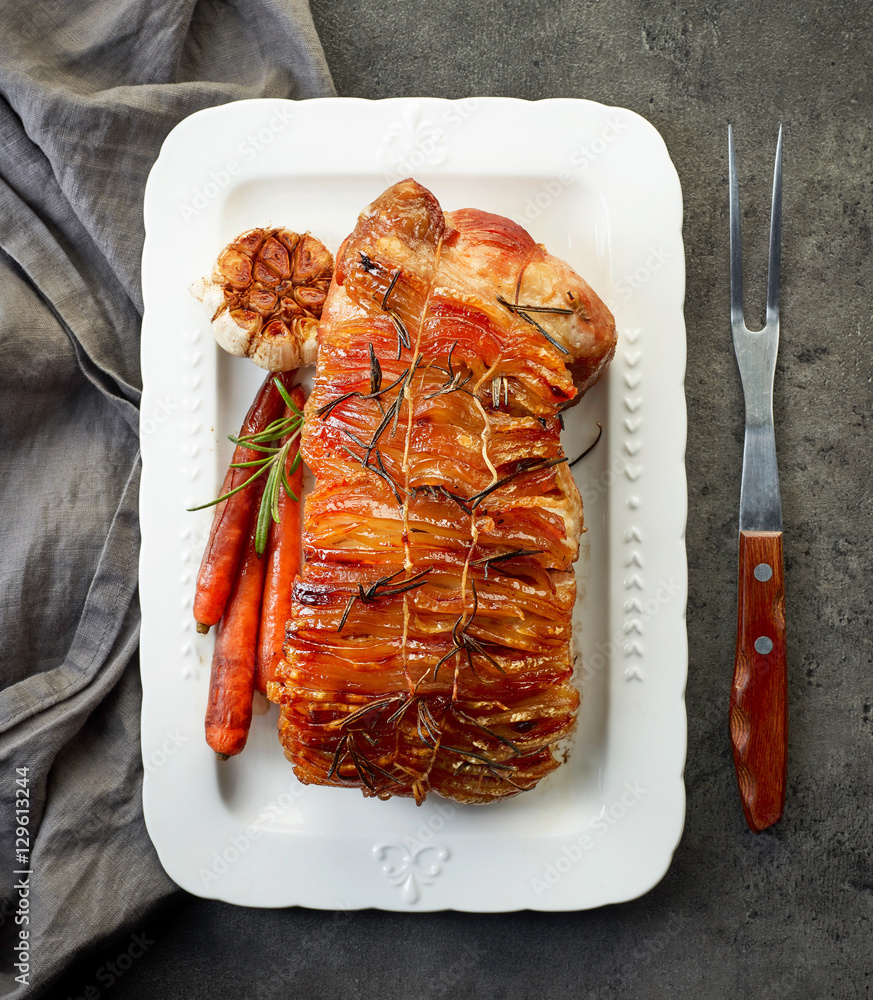 roasted pork on white plate Stock Photo | Adobe Stock