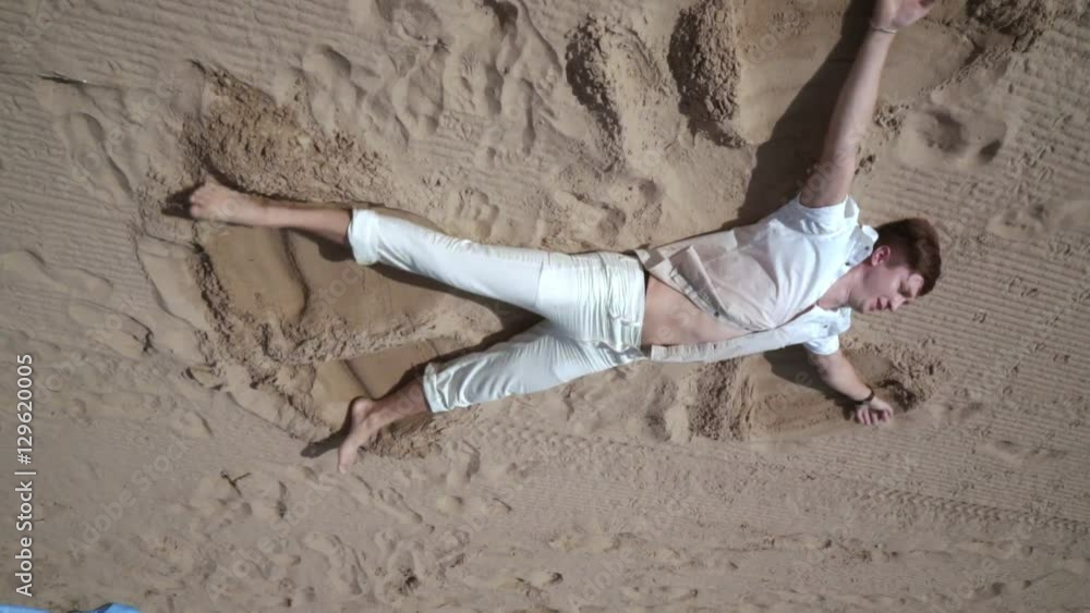 Man relax on beach. Man lying on sand. Beach relax. Man relaxing sand ...
