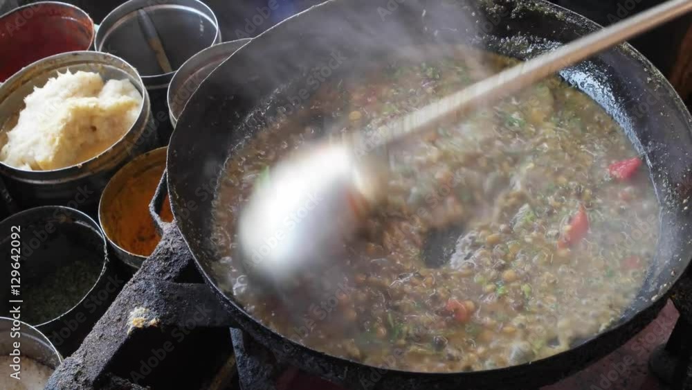 Indian food and sweets cooking, preparation, werving at a Dhaba- a ...