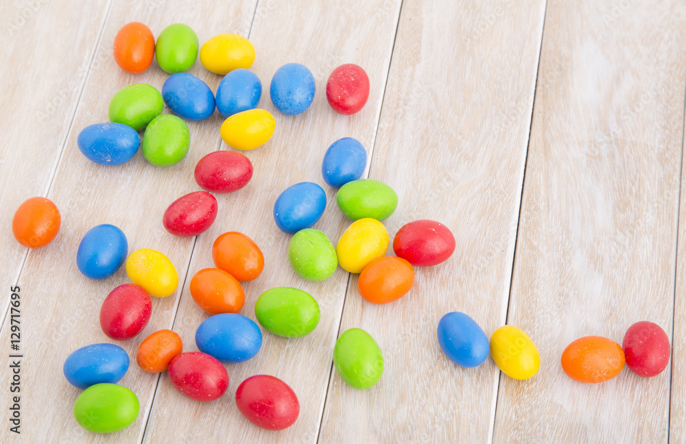 Chocolate covered peanuts with a candy shell isolated on white ...