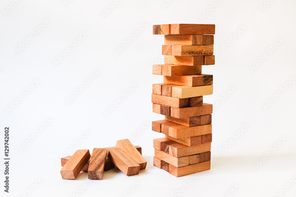 Wood block Stack tower game for children playing on wooden table with ...