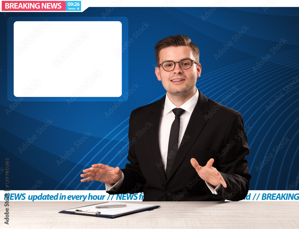 Television reporter telling breaking news at his studio desk wit Stock ...