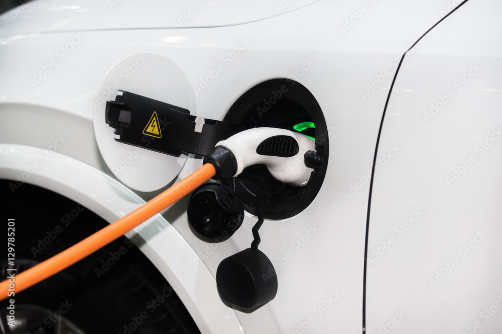 Power supply for hybrid electric car charging battery. Eco car c Stock ...