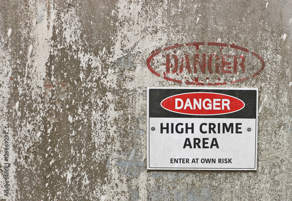 red, black and white Danger, High Crime Area warning sign Stock Photo ...