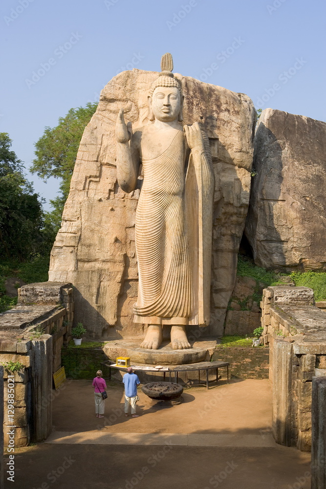 Giant statue dating from the 5th century, of the standing Buddha giving ...