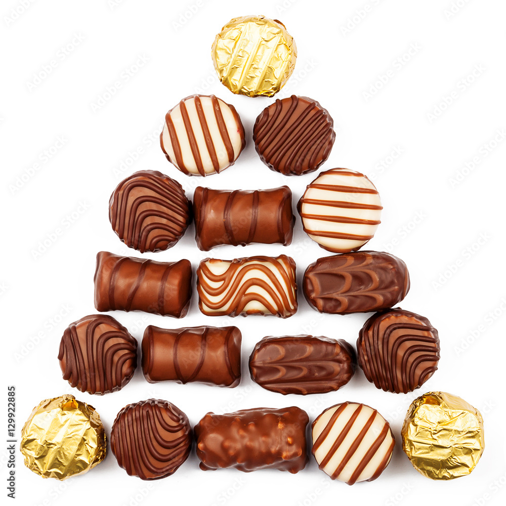 Triangle made of chocolate candies Stock Photo | Adobe Stock