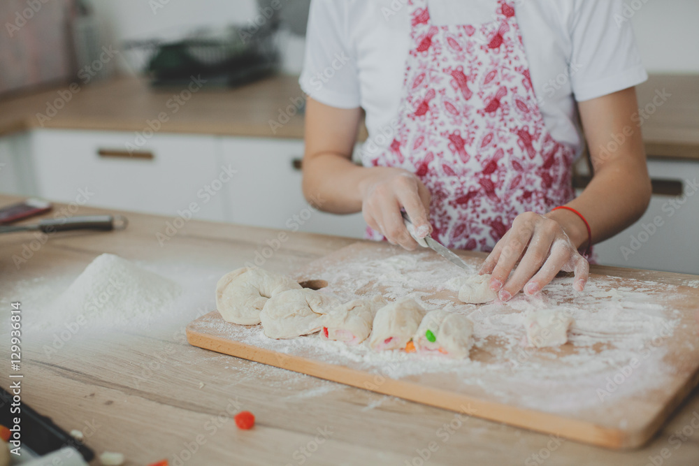 Mother with her daughter are preparing the buns Stock Photo | Adobe Stock