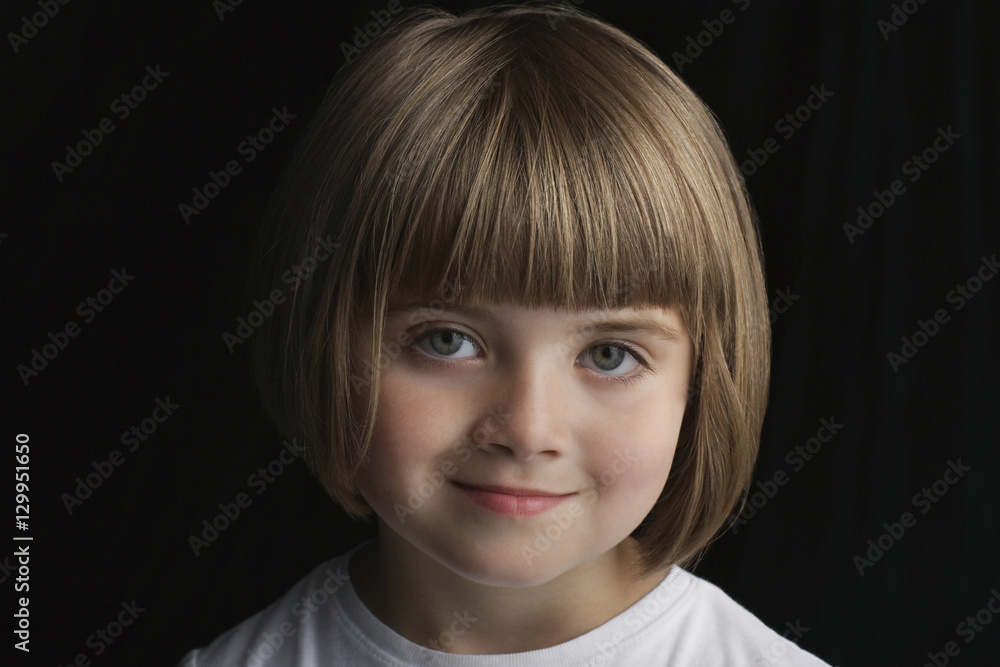Closeup portrait of happy cute little girl with short hair isolated on ...