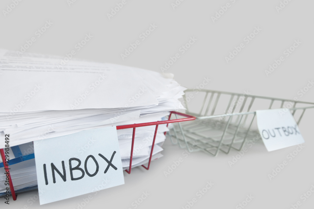 Inbox and outbox trays in an office over white background Stock Photo ...