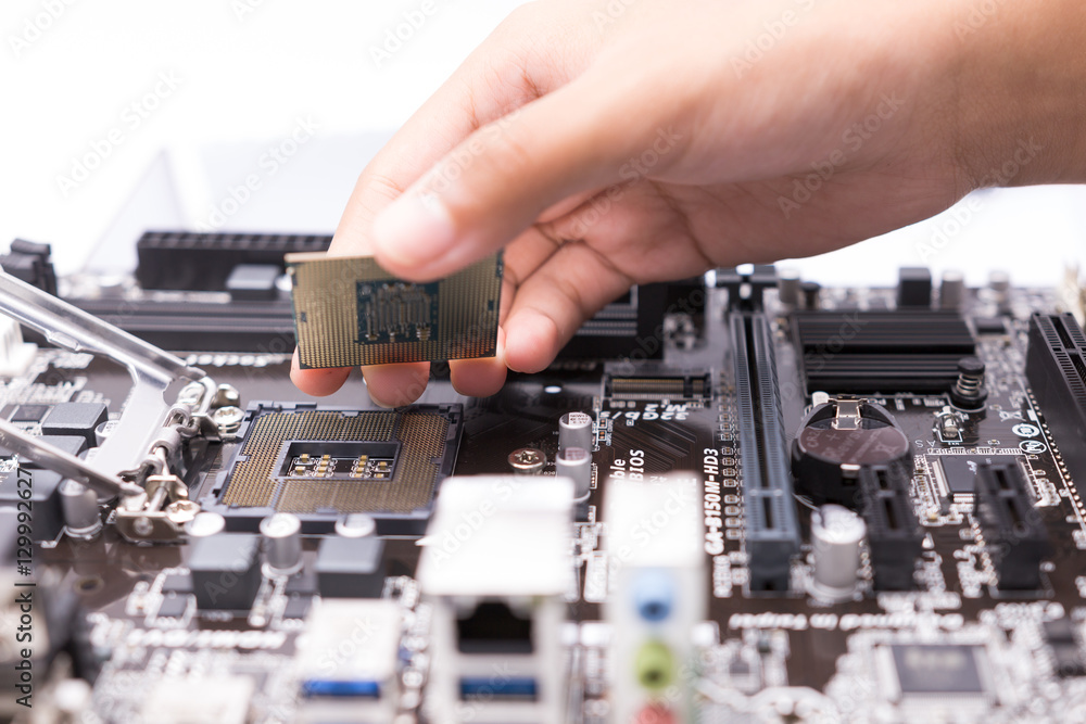 Assembling high performance personal computer, inserting CPU, pr Stock ...