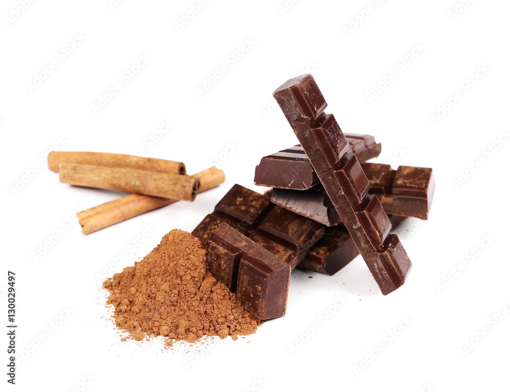 chocolate bars with cinnamon sticks and pile cocoa powder isolated on ...
