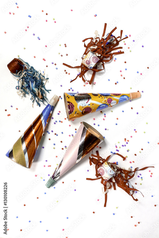 Party horns, confetti and noise makers on white background Stock Photo ...