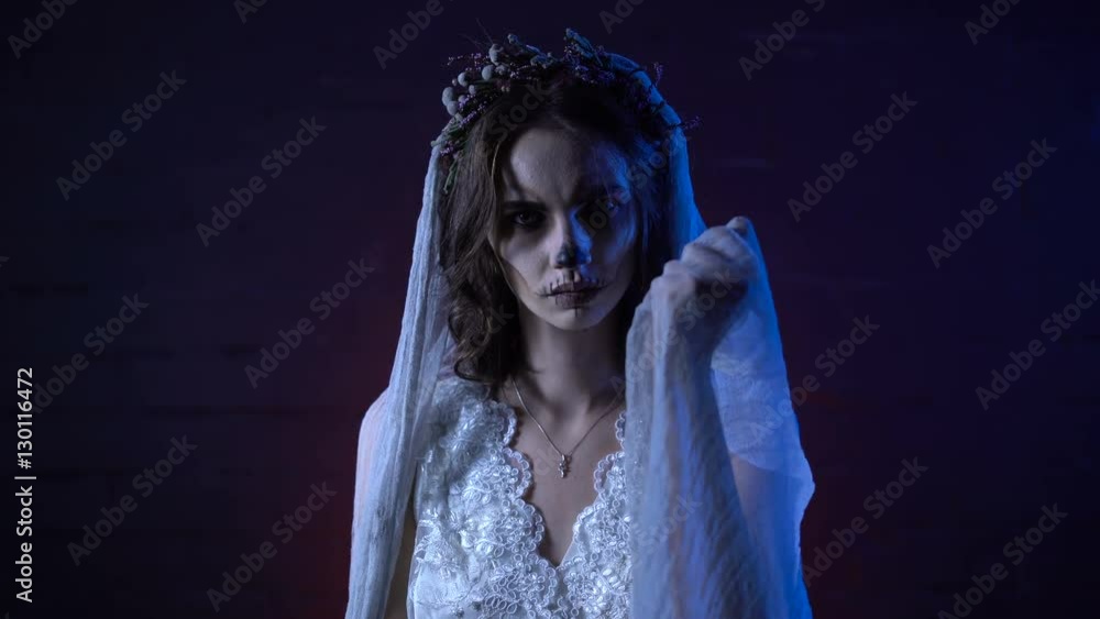 Horror halloween scene of a corpse bride with sad face and sewed mouth ...