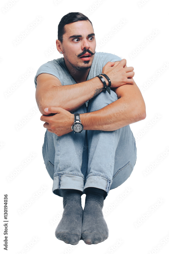 Young man scared and freeze from the cold Stock Photo | Adobe Stock
