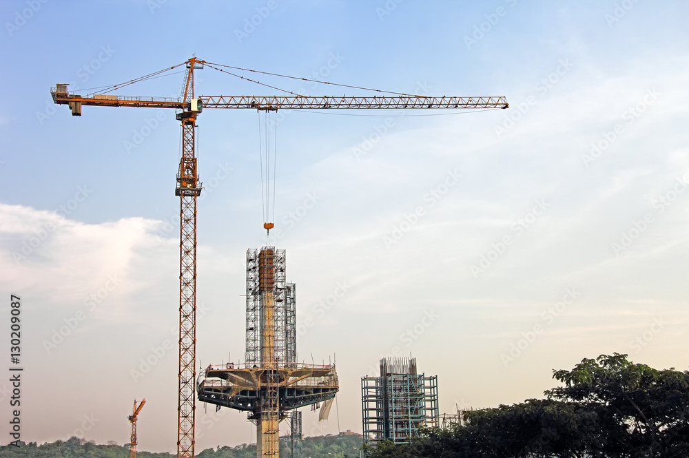 Construction of tall concrete pylon of bridge using tower crane Stock ...