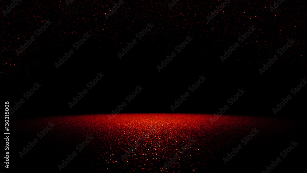twinkling red glitter falling on a flat surface lit by a bright ...