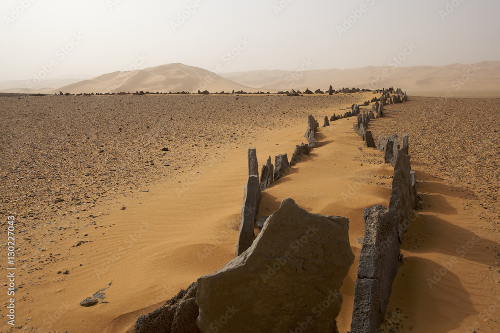 Foundations of an ancient temple on the reg Taita in the Akakus plateau ...