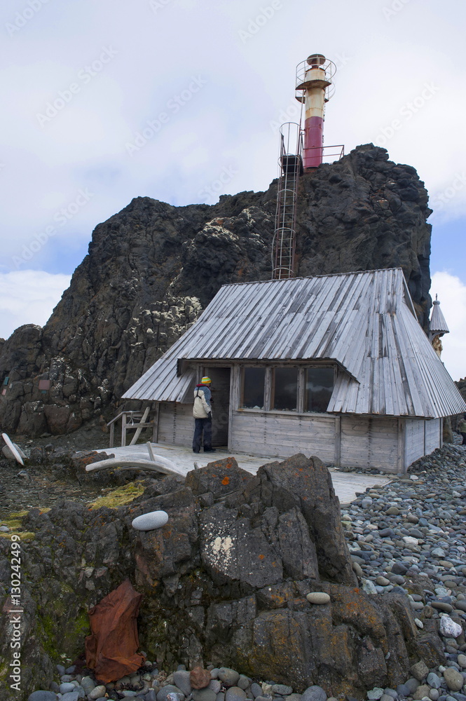 Little chapel and lighthouse at the Henryk Arctowski Polish Antarctic ...