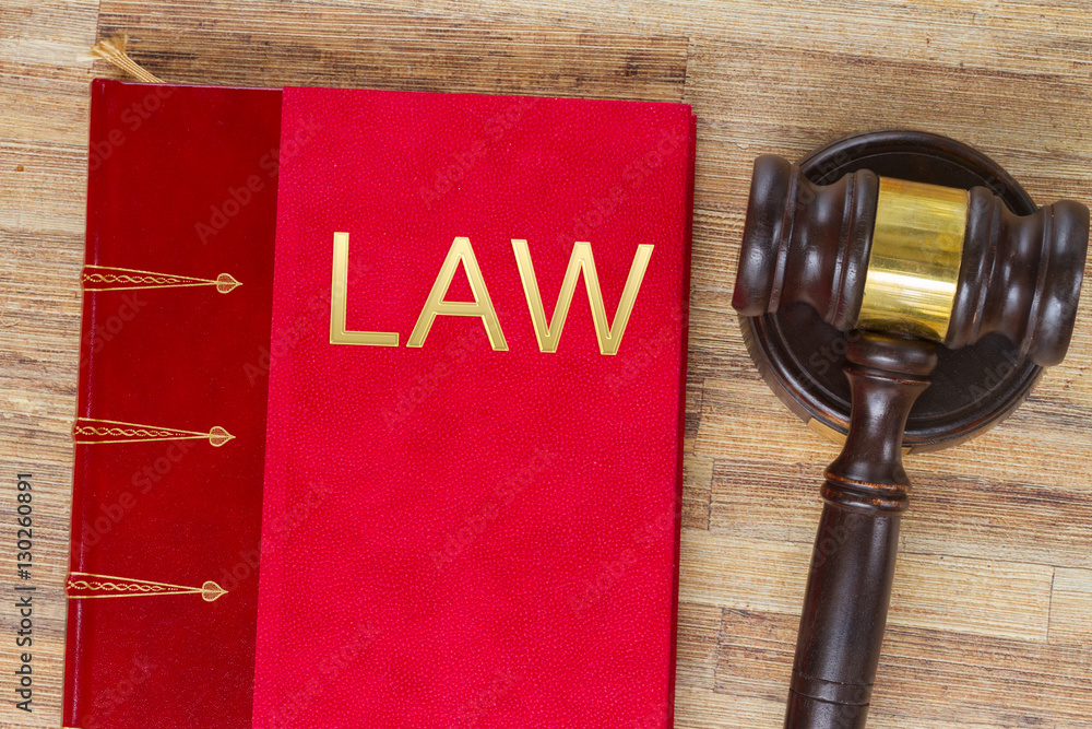 Wooden Law Gavel and legal book on wooden desktop with word Law, top ...