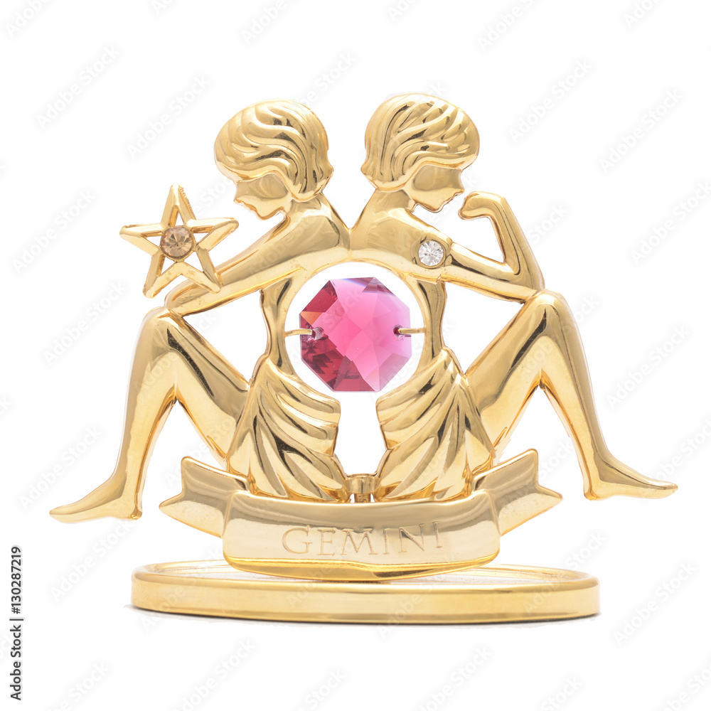 twins gold figurine isolated on white Stock Photo | Adobe Stock