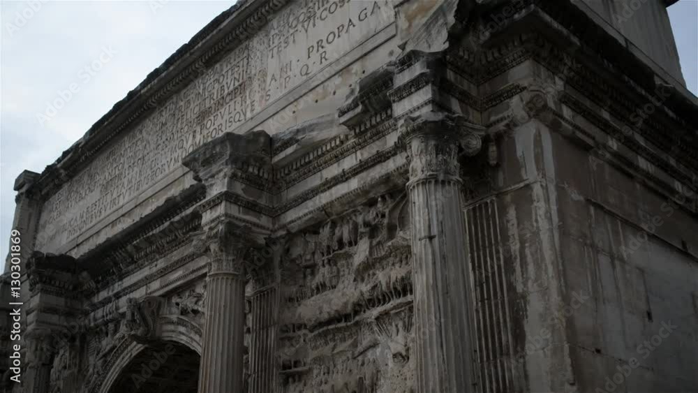 White marble Arch of Septimius Severus at northwest end of Roman Forum ...