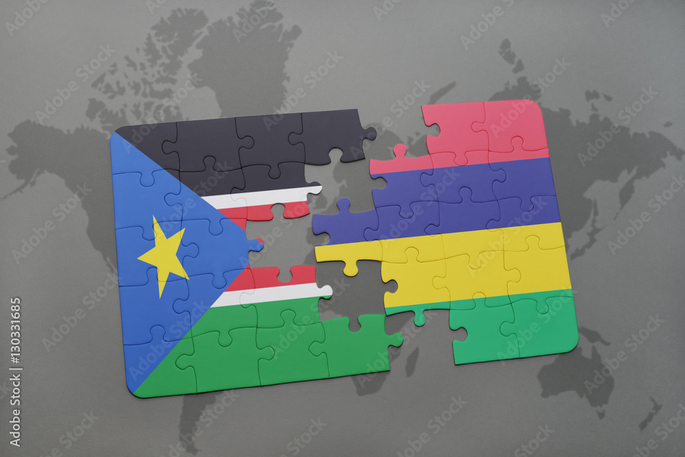 puzzle with the national flag of south sudan and mauritius on a world ...