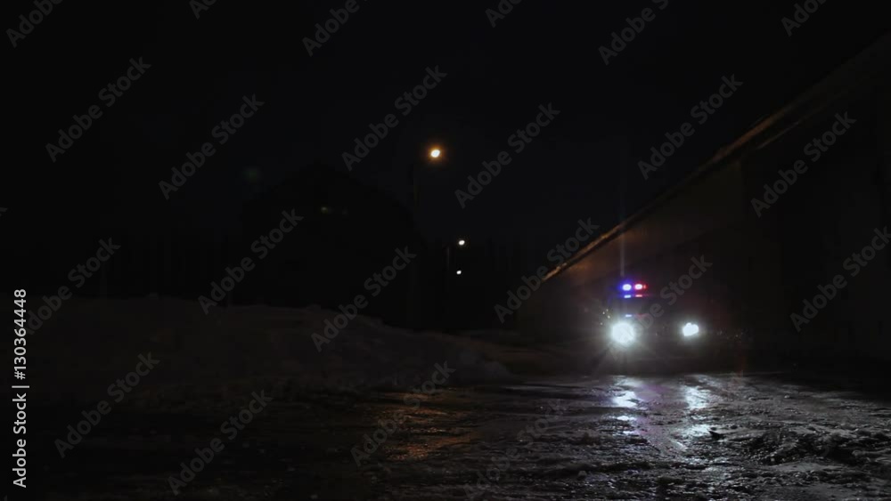 Police Car Patrols at Night. Police car with special signals patrol in ...