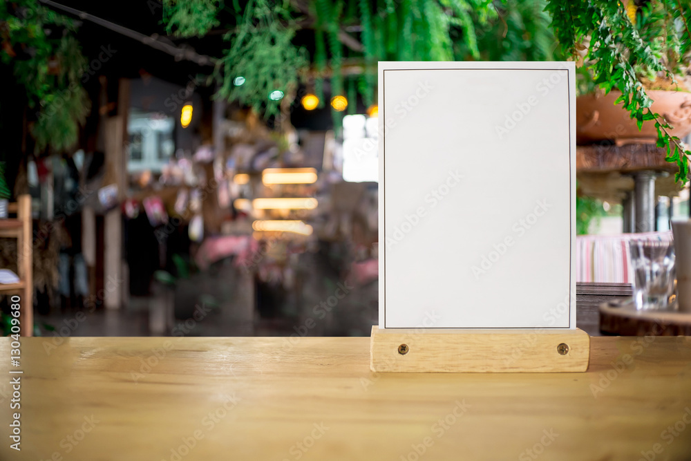 Foto de White label on the table. Used for menus or put everything into ...