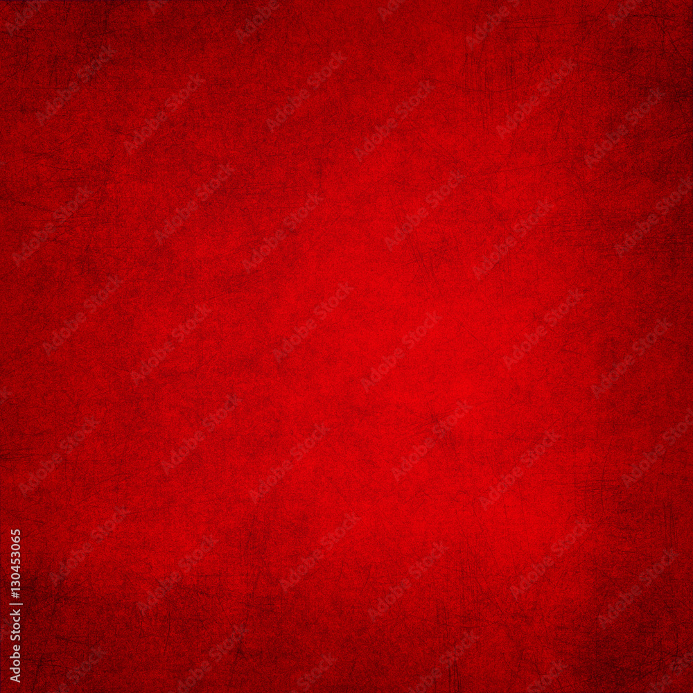 abstract red background or Christmas paper with bright center spotlight ...