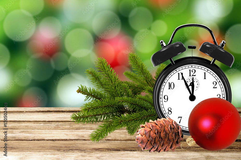 Christmas holiday background with alarm clock and tree branch on Stock ...