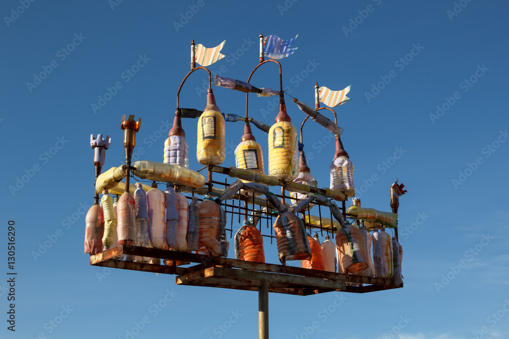 Colorful castle from plastic bottles. The idea of recycling and waste ...