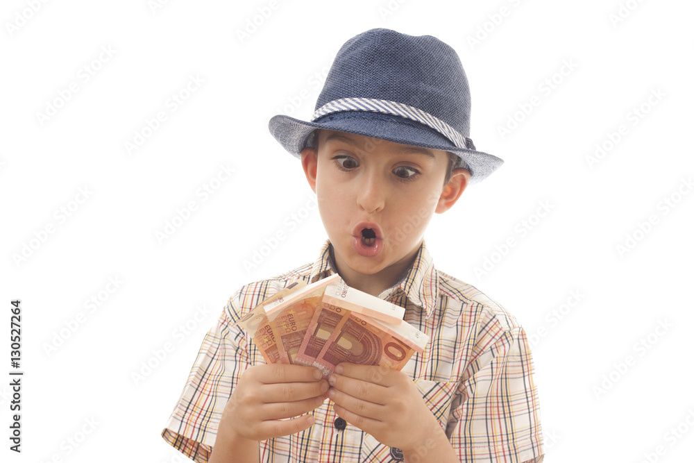 Caucasian kid with hat holding euro money in his hand. Schoolboy with ...