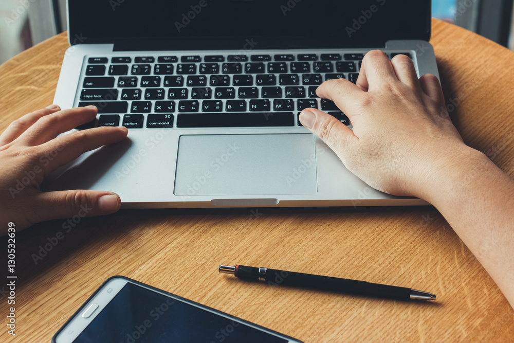 Typing on a laptop keyboard tablet Stock Photo | Adobe Stock