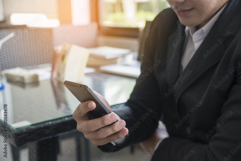 Businessman using smart phone,happy and smile face,negotiating business ...