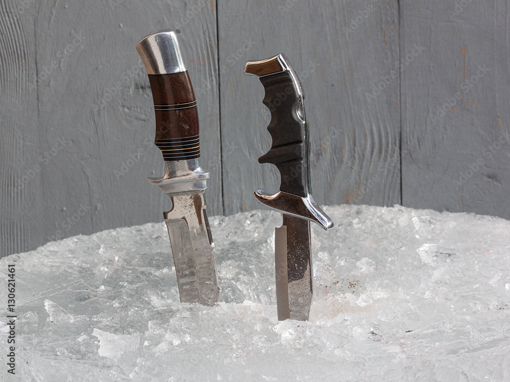 hunting knife on the ice Stock Photo | Adobe Stock