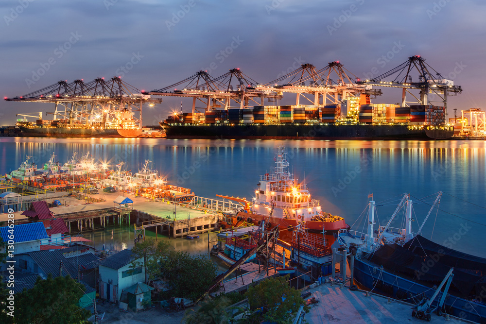 International Container Cargo ship with ports crane bridge in harbor ...