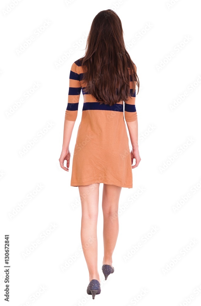 back view of walking woman . Stock Photo | Adobe Stock